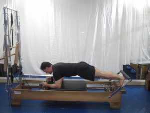 73. Plank prep, moving carriage only with arms - Abalance